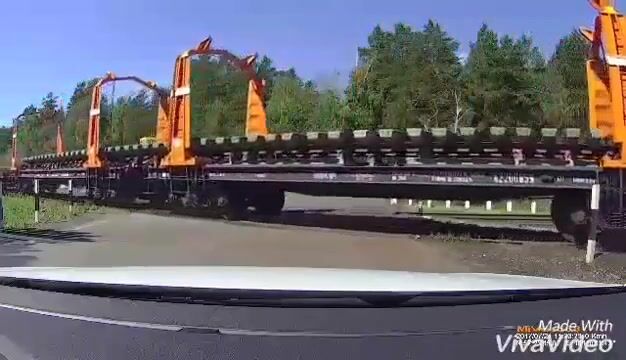 Semi Truck Tries To Drive Over Train Tracks