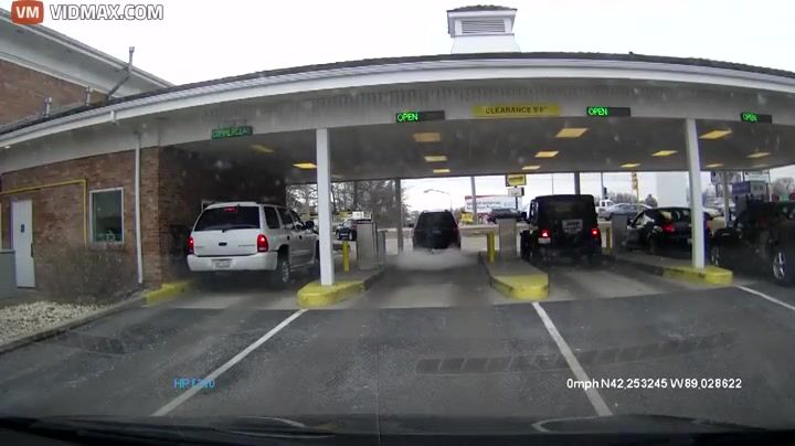 The SUV Accelerated Out Of The Bank Driveway And Took Off.